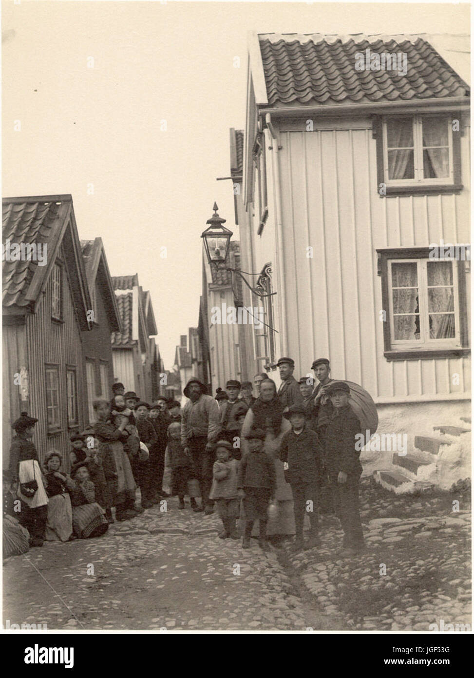 Carl Curman - People in the old part of Lysekil, Sweden Stock Photo - Alamy
