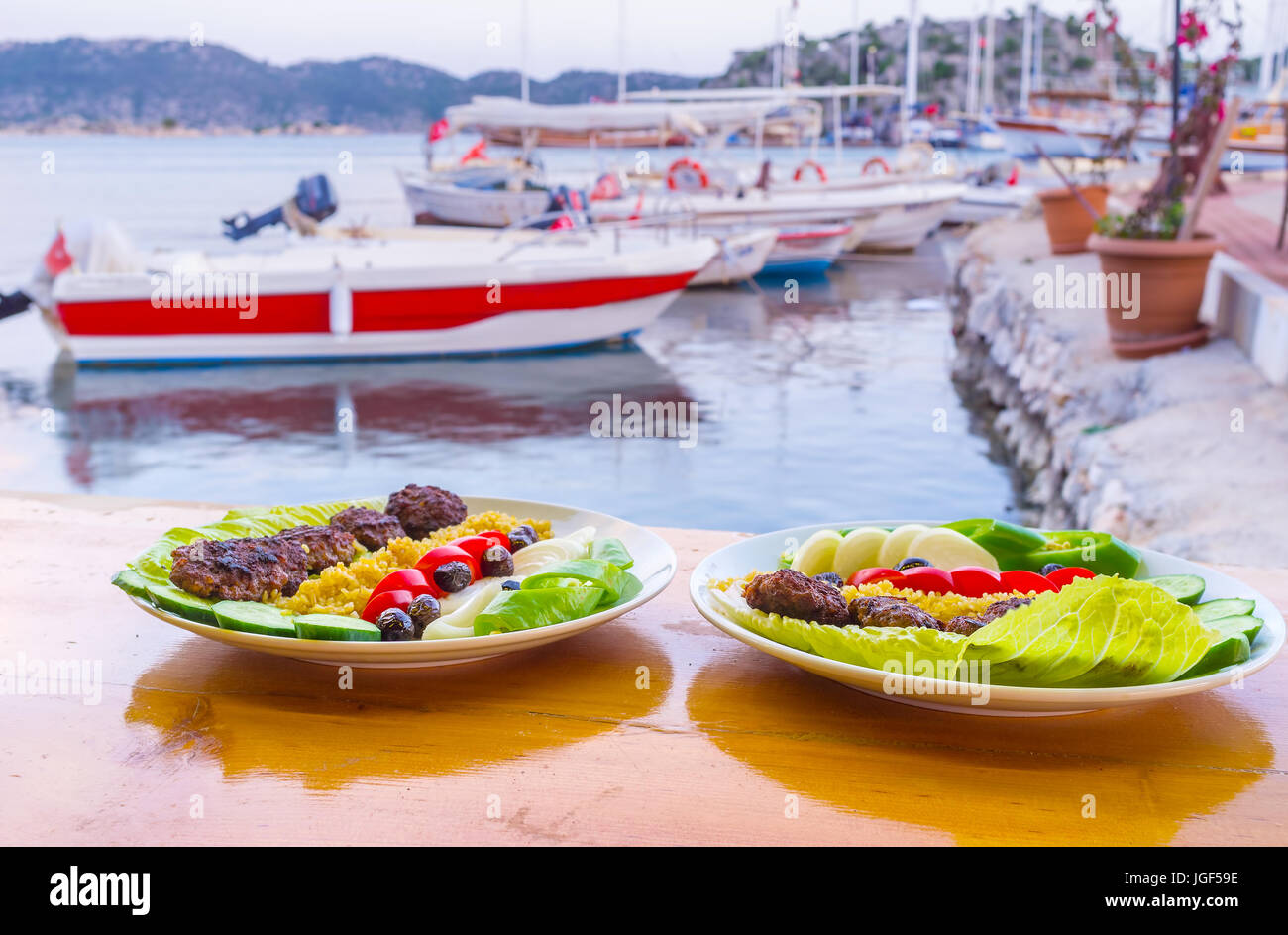 The outdoor port cafe offers tasty turkish dish kofta with view on ...