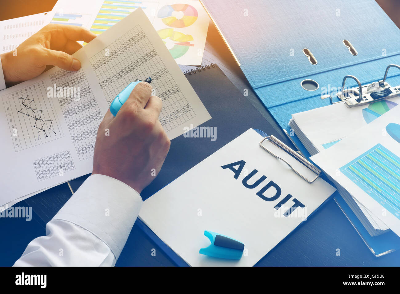 Document with title Audit on an office table Stock Photo - Alamy