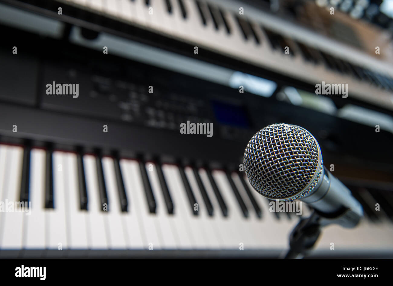 Studio room with synthesizer and microphone equipment, France Stock ...