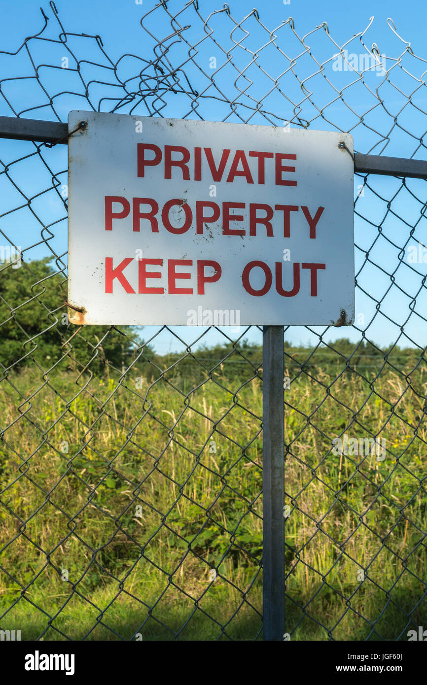 Sign for Private Property Keep Out. Metaphor for 'obey', limited access ...