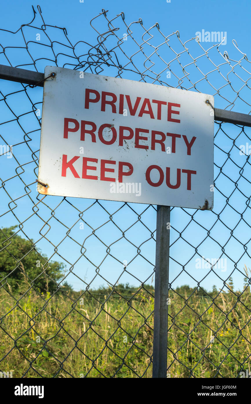 Sign for Private Property Keep Out. Metaphor for 'obey', limited access ...