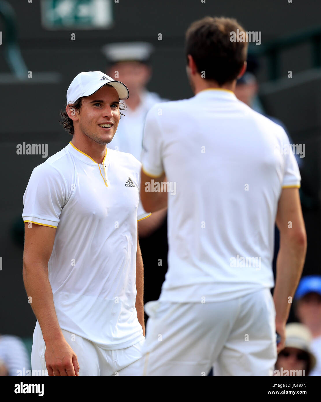 Dominic Thiem (left) and Gilles Simon during their match on day four of ...