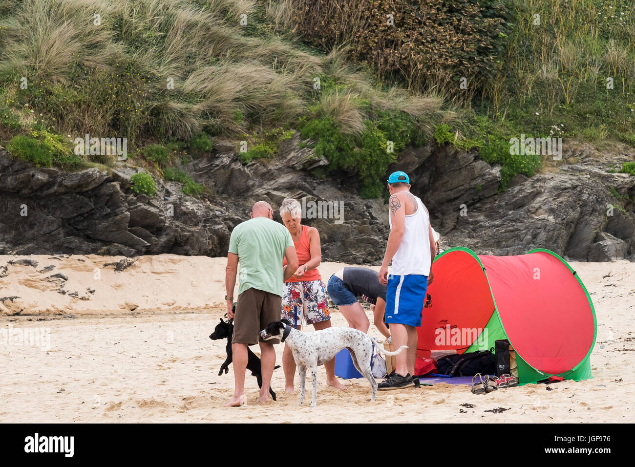 People on the beach. Holidaymakers at Harlyn Bay on the North Cornwall ...