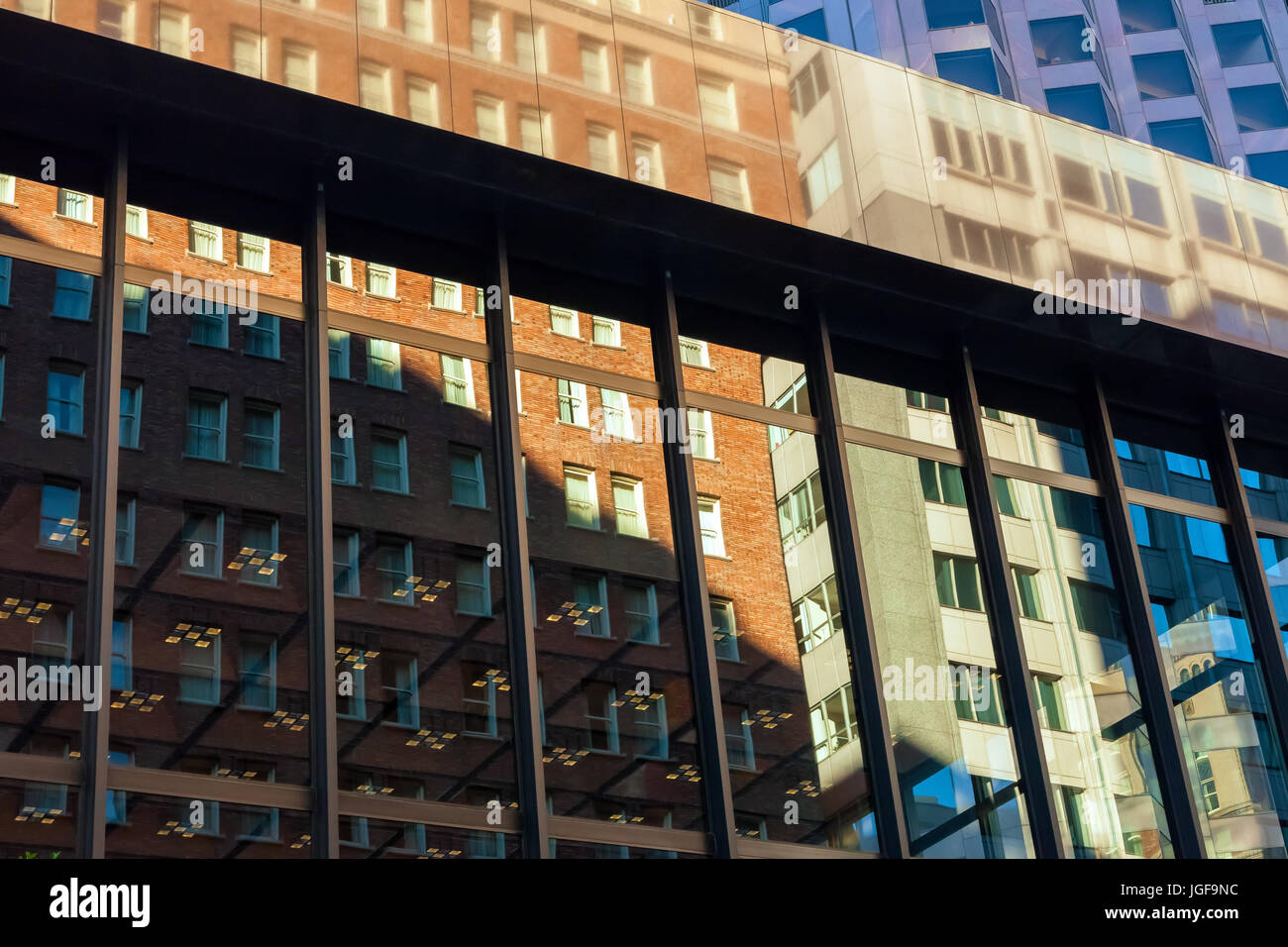 A close up shot at the reflections on the glass windows of the ...