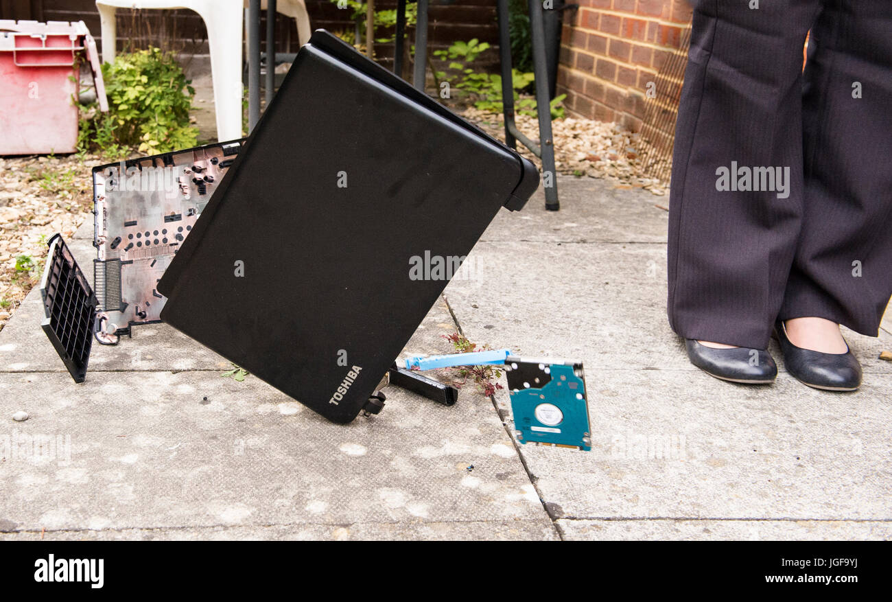Broken Toshiba laptop Stock Photo - Alamy
