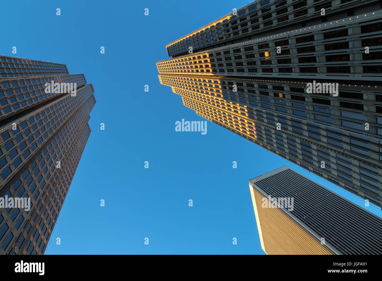 morning sunlight reflected on the high rise buildings in downtown San ...