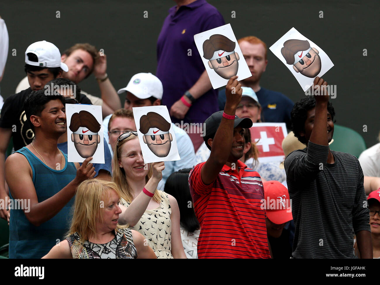 Roger Federer fans on centre court on day four of the Wimbledon ...