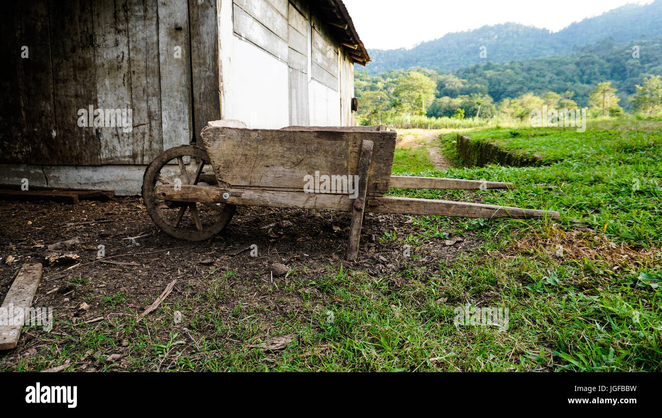 Wooden barrow hi-res stock photography and images - Alamy