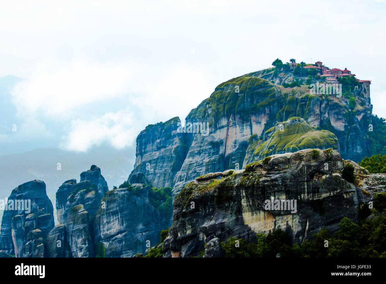 cliffs of Meteora with monastery in the background Stock Photo - Alamy
