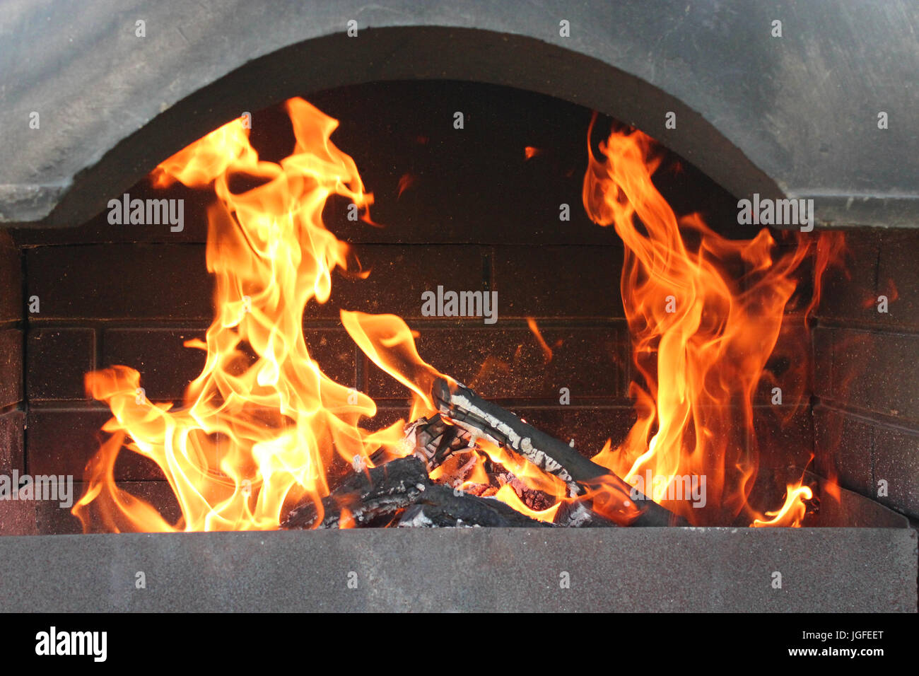 big brazier with burning fire prepared for cooking Stock Photo - Alamy