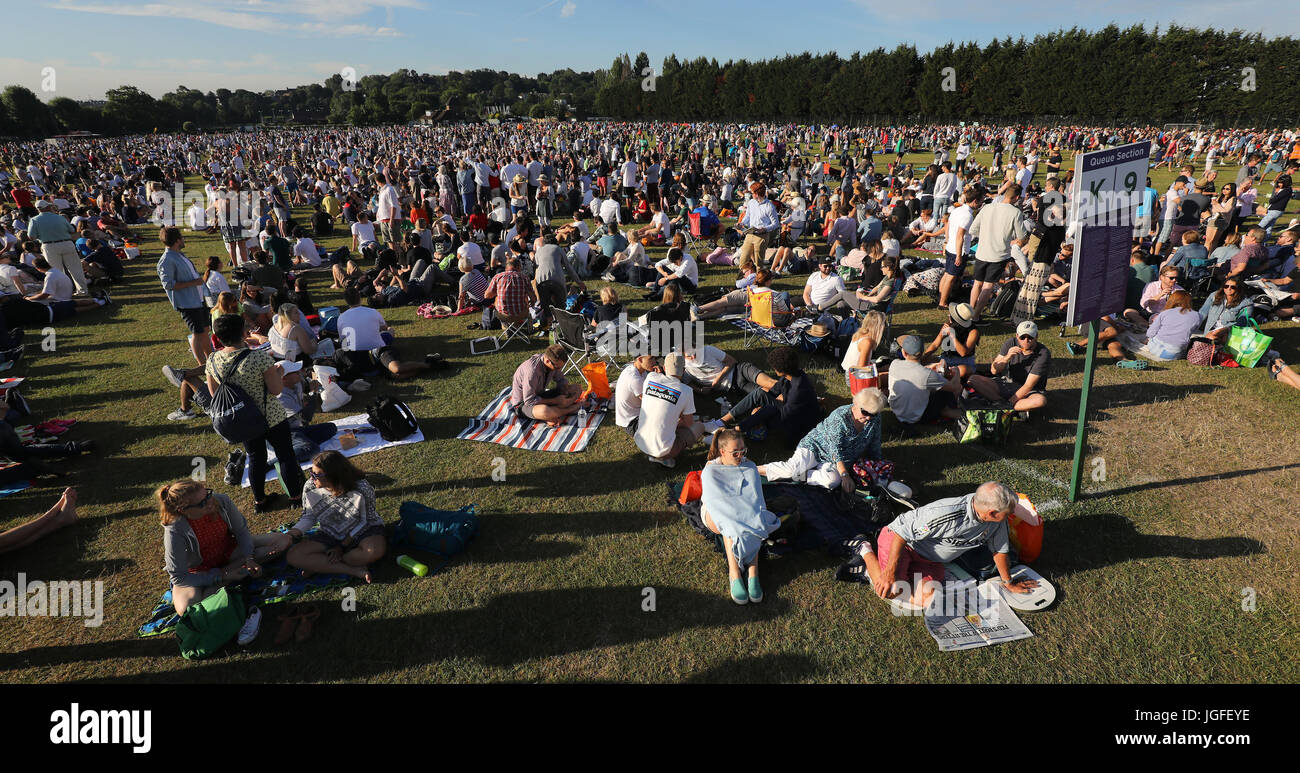 People waiting in the Wimbledon Park queue during day five of the ...