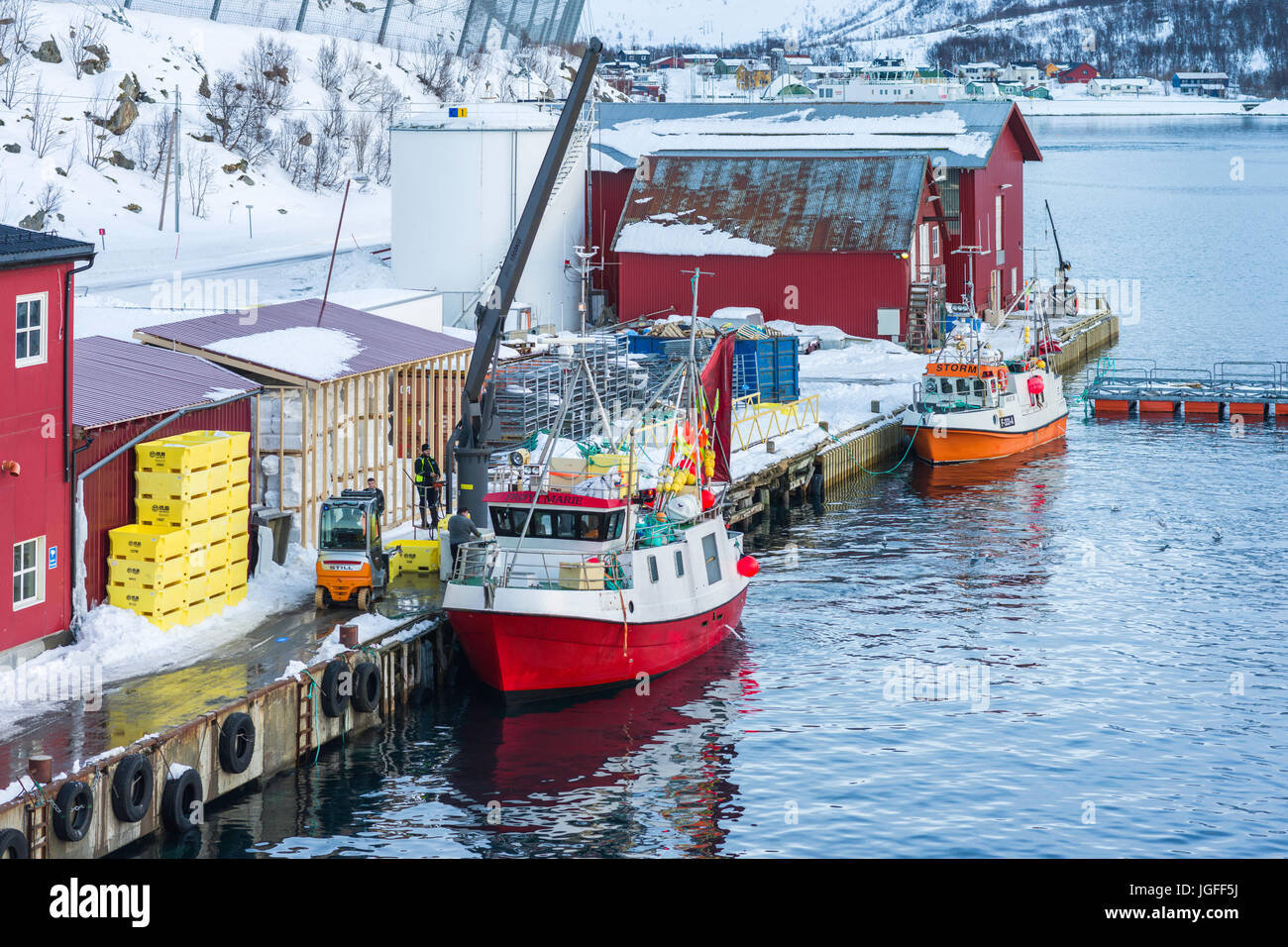 Fishing boats unloaading at Øksfjord, Finnmark County, Norway Stock ...