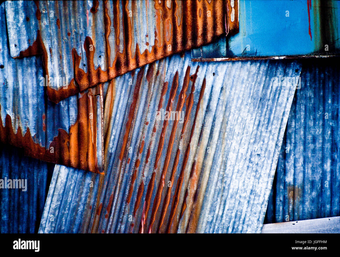 Rusty sheet metal near window Stock Photo - Alamy