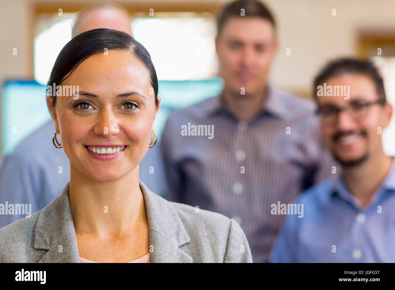 Team smiling together hi-res stock photography and images - Alamy