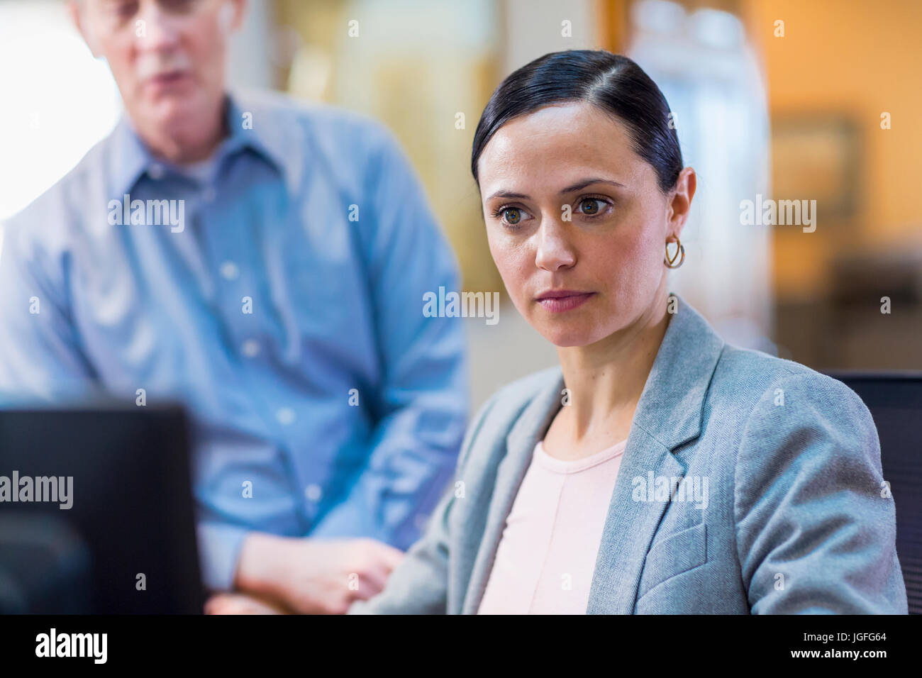 Caucasian business people using computer Stock Photo - Alamy