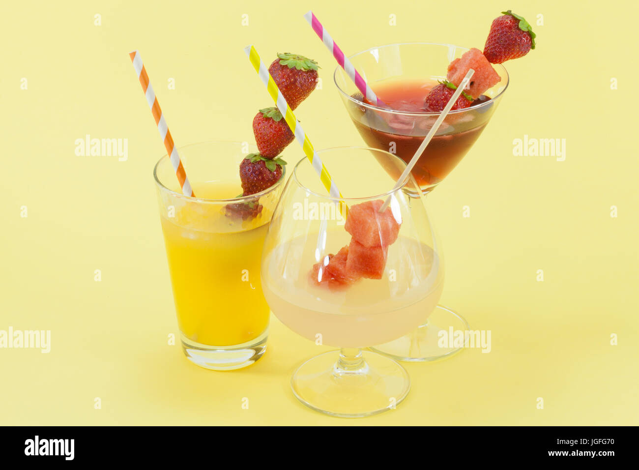refreshing drinks on colored background Stock Photo - Alamy