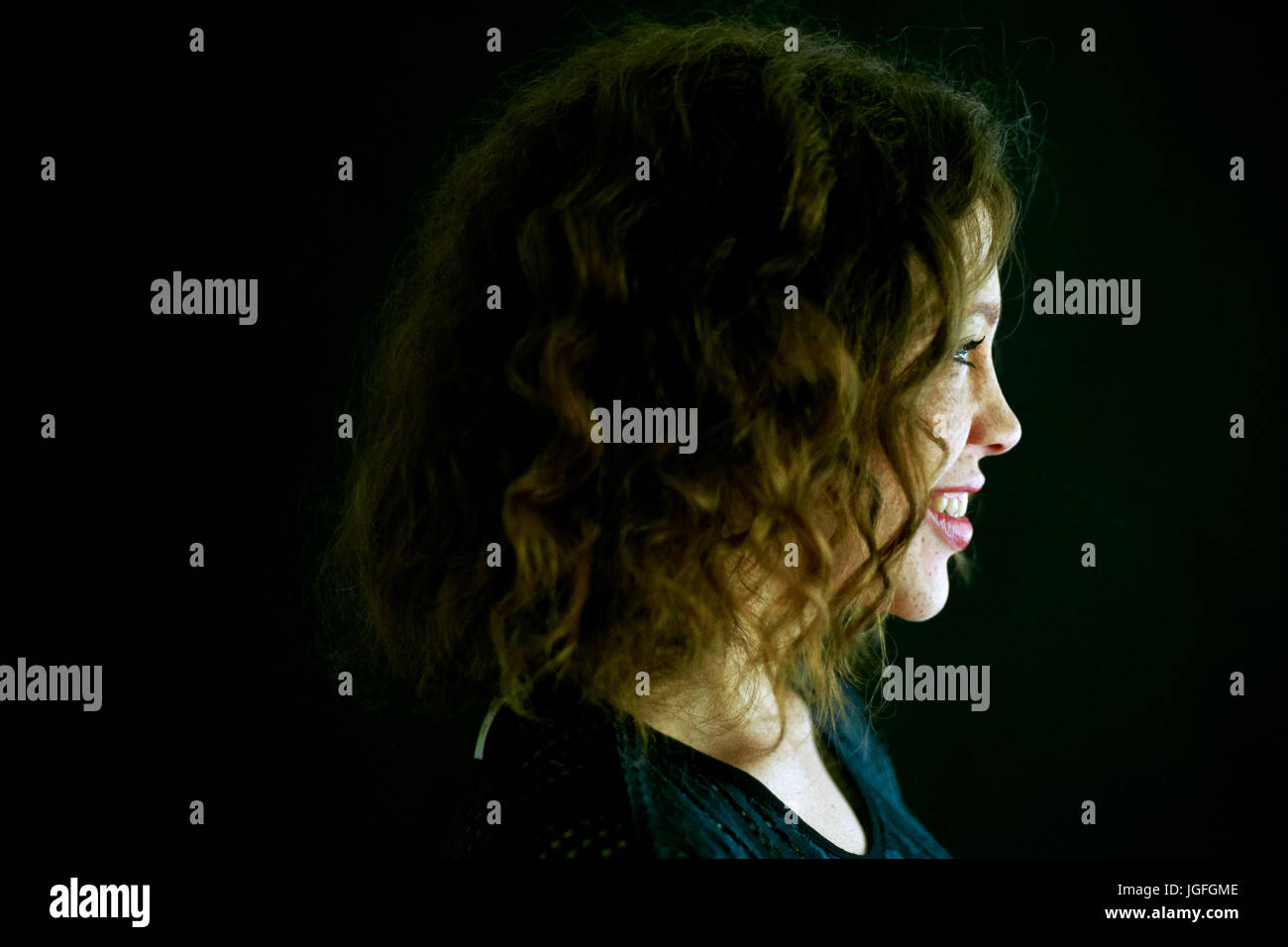 Smile smiling side profile hi-res stock photography and images - Alamy