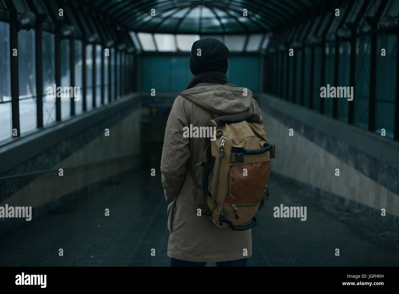 Man carrying back pack hi-res stock photography and images - Alamy