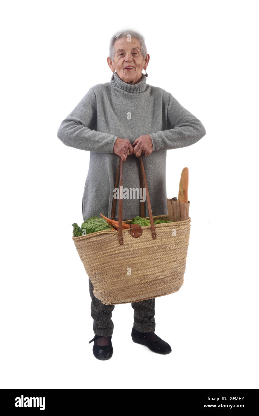 Old woman carrying heavy load hi-res stock photography and images - Alamy