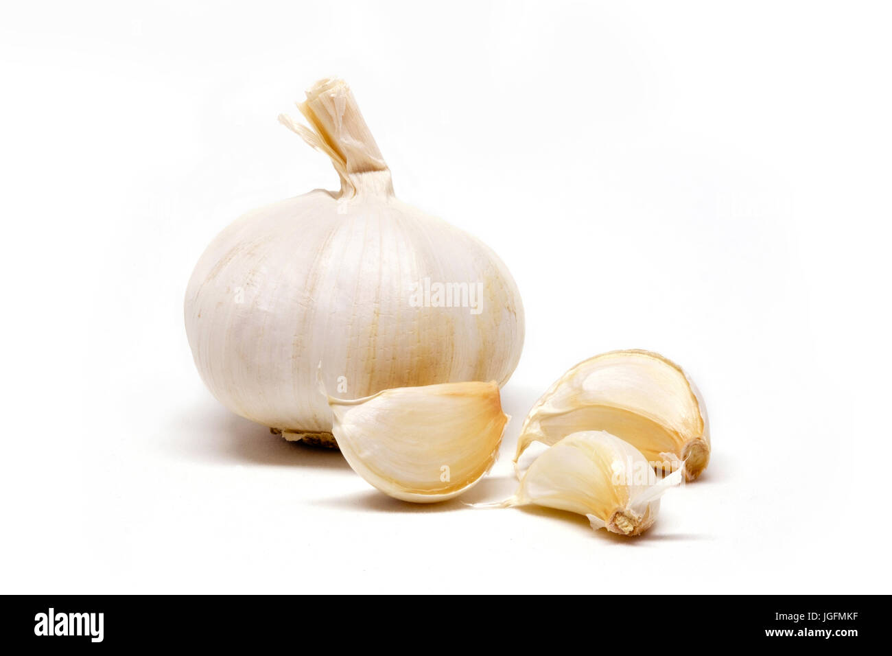 Garlic on white background Stock Photo - Alamy