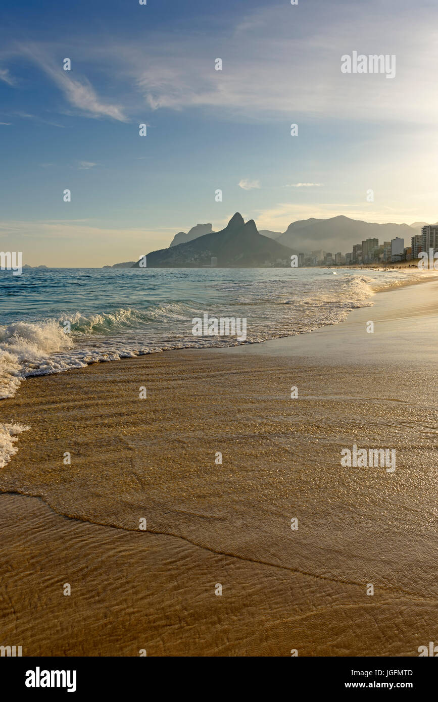 Arpoador beach in Rio de Janeiro, with buildings and the seaside at ...