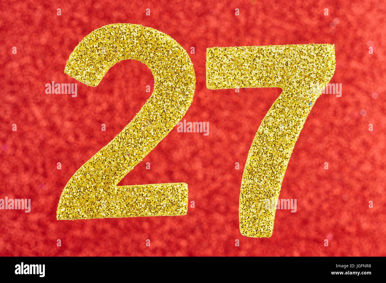 Number twenty-seven yellow color over a red background. Anniversary ...