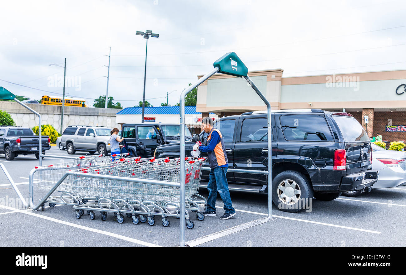 Burke, USA - June 16, 2017: Hmart shopping carts with man worker ...