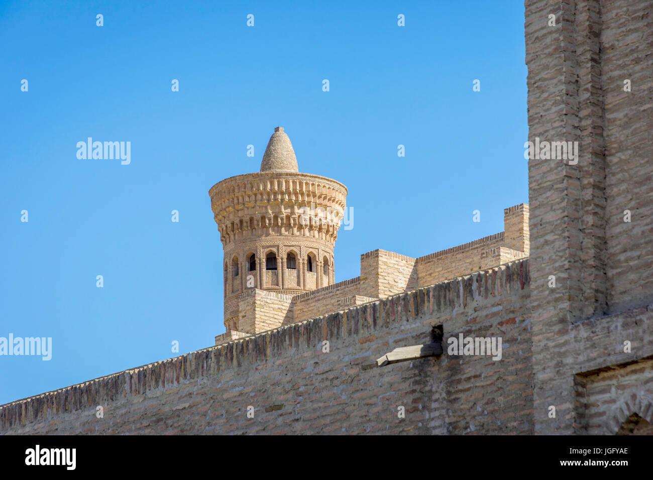 Kalyan minaret and the wall, Bukhara, Uzbekistan Stock Photo - Alamy