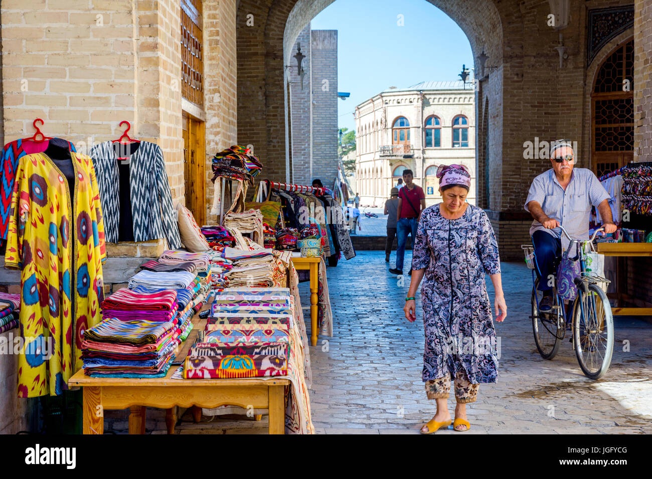 BUKHARA, UZBEKISTAN - SEPTEMBER 4: Street bazaar with souvenirs and ...