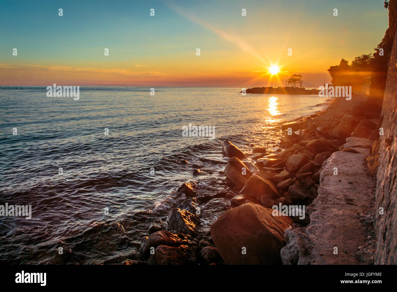 A spring sunset in the italian summer Stock Photo - Alamy