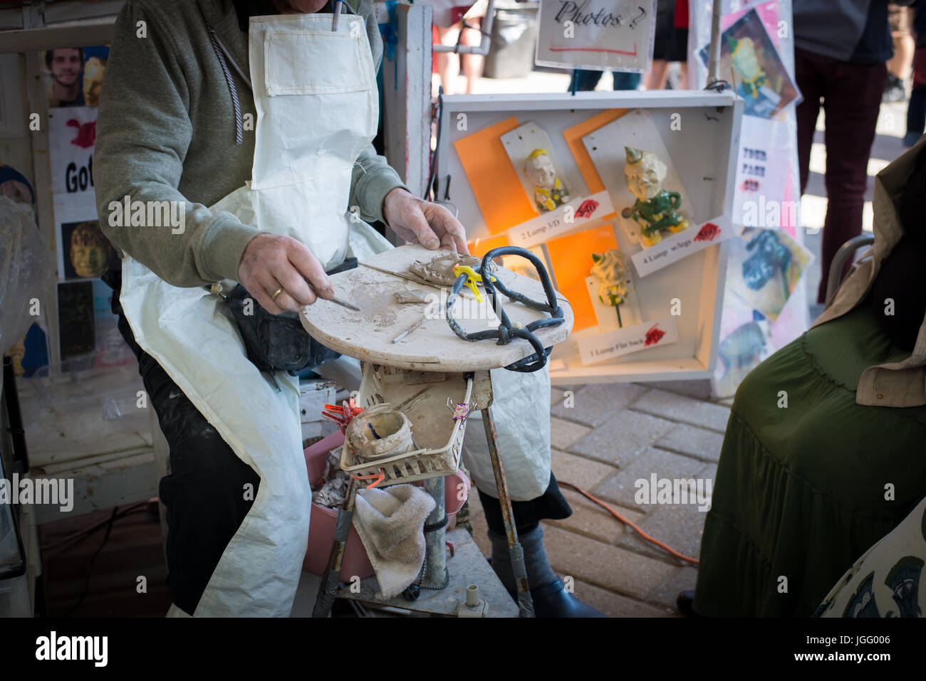 Artist selling face sculptures at farmer's market in Oregon Stock Photo ...