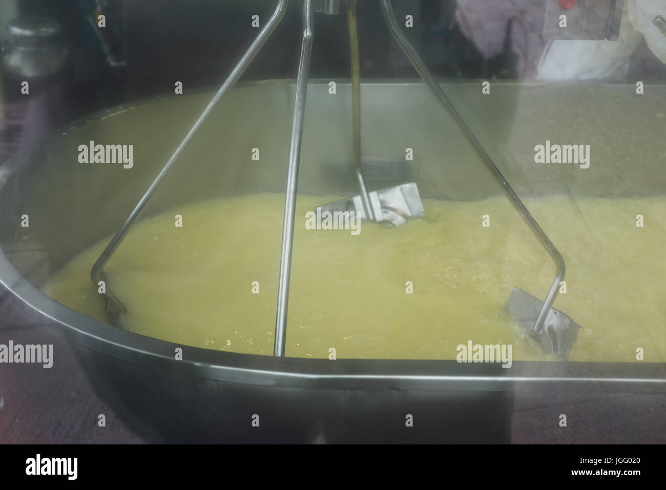 Making cheese in a large vat Stock Photo - Alamy