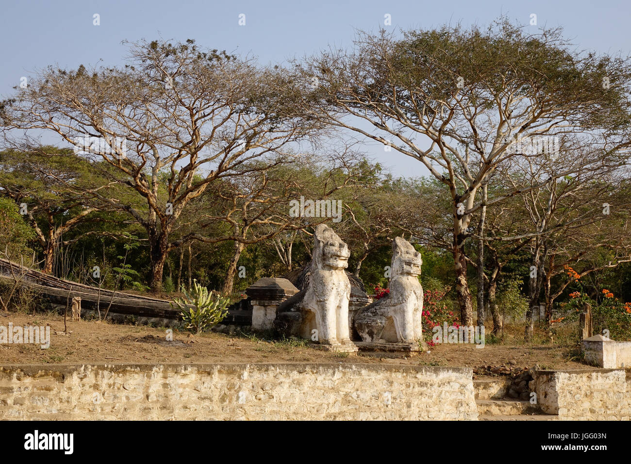 Lion statues at the gate of ancient temple in Bagan, Myanmar. Bagan is ...
