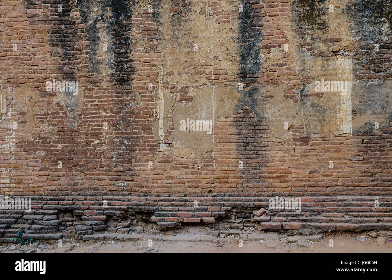 Ancient brick wall of a Buddhist temple in Bagan, Myanmar. Bagan is one ...