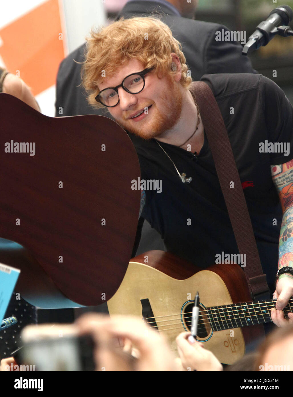New York, USA. 6th July, 2017. Singer ED SHEERAN signs autographs at ...