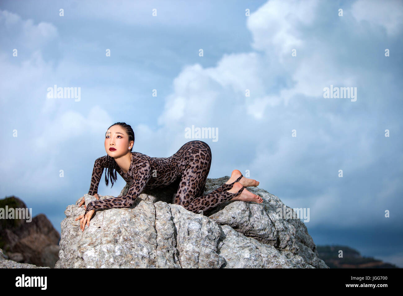 Hainan, China. 6th July, 2017. Chinese contortionist Liu Teng performs ...