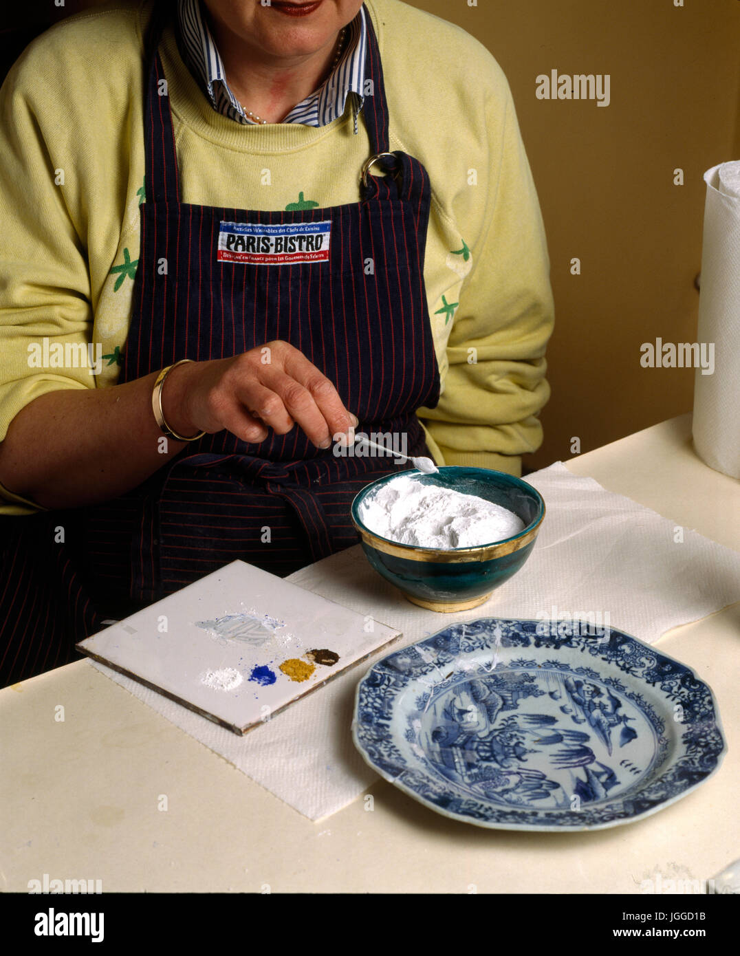 Mending a broken plate Stock Photo - Alamy