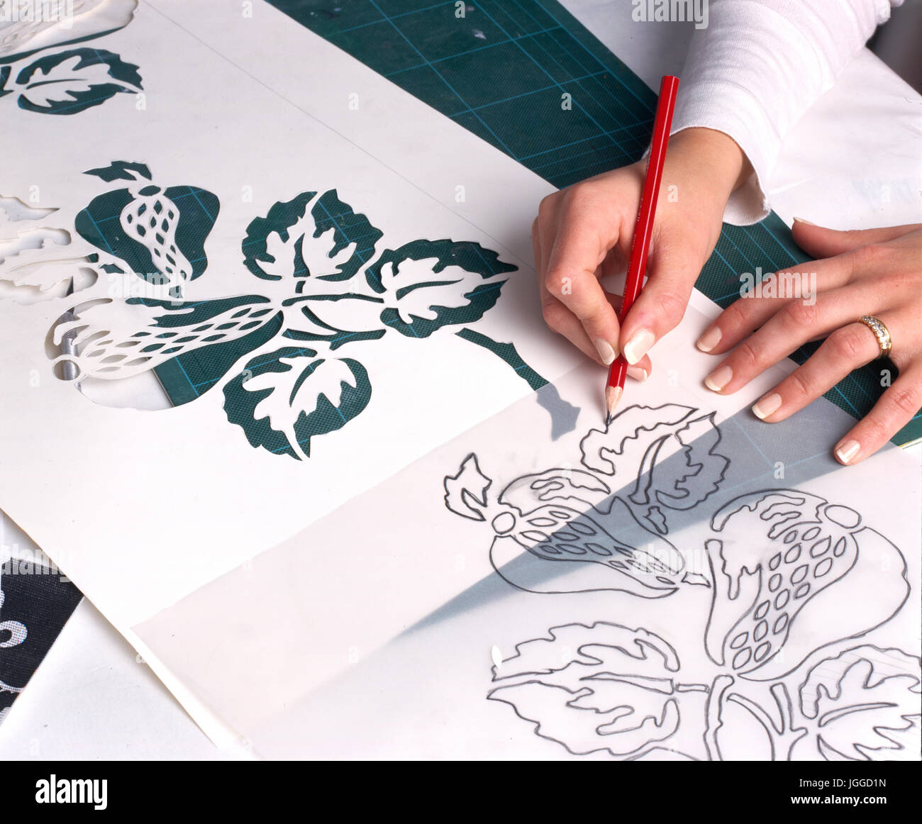 Mending a broken plate Stock Photo - Alamy