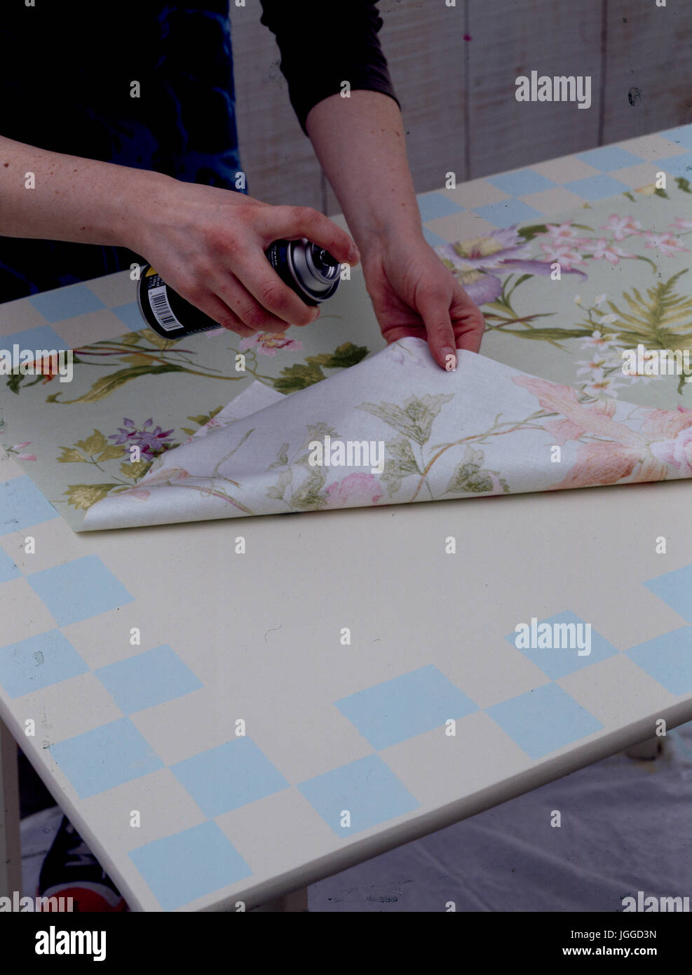 Step x step decorating and renovation of table: Hands aerosol spraying ...