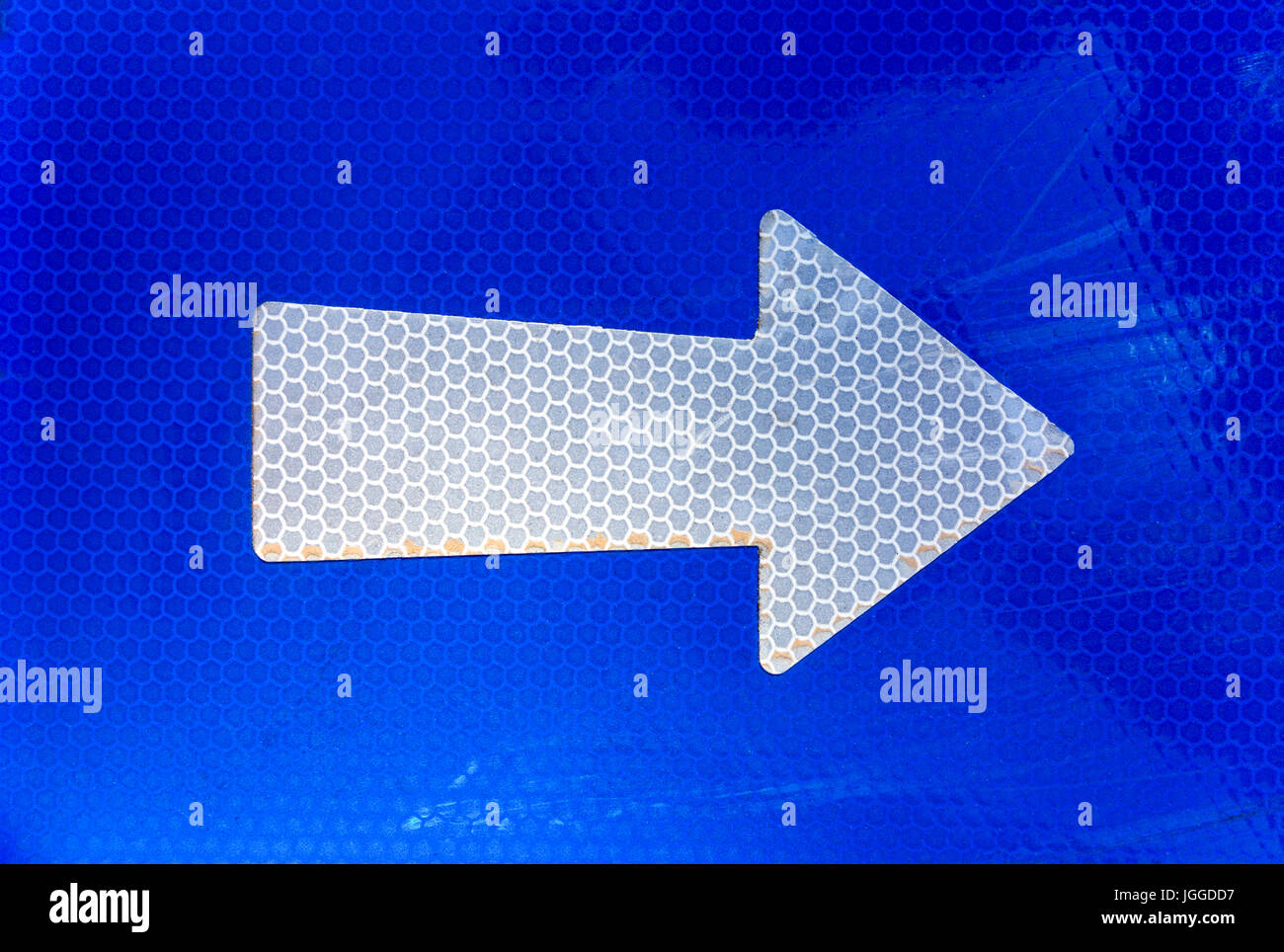 Right arrow on road sign. Close-up Stock Photo - Alamy