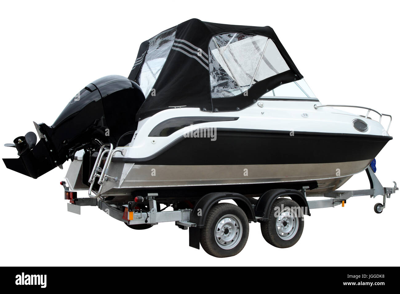Modern motor boat with canvas top on a trailer Stock Photo - Alamy