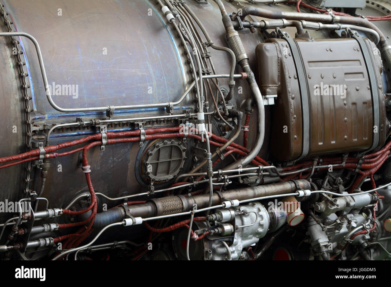 Pipelines and electric cables on the body of a modern aircraft engine ...