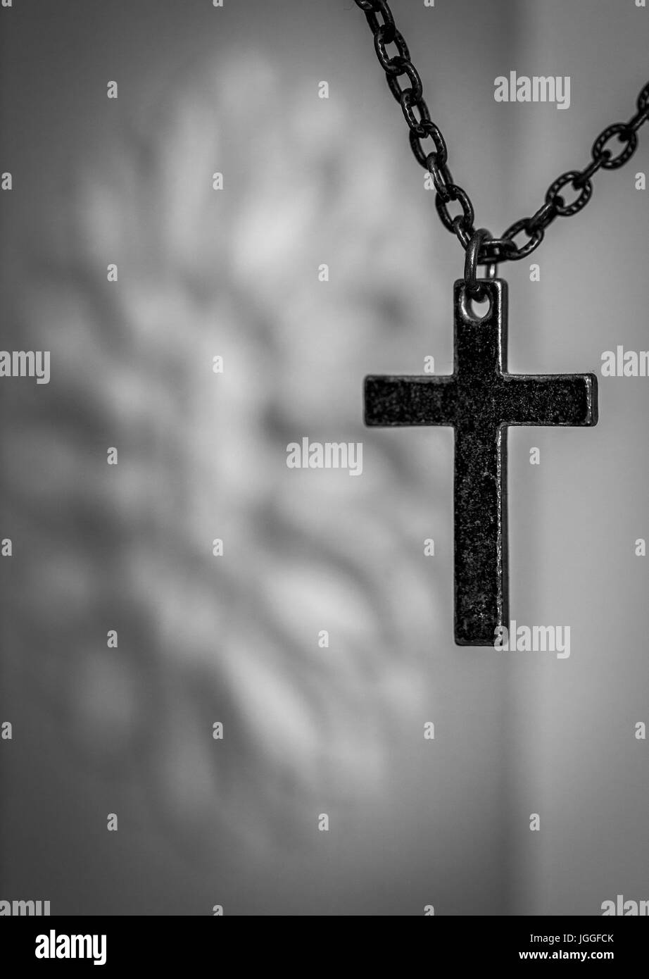 Metal cross pendant Stock Photo - Alamy