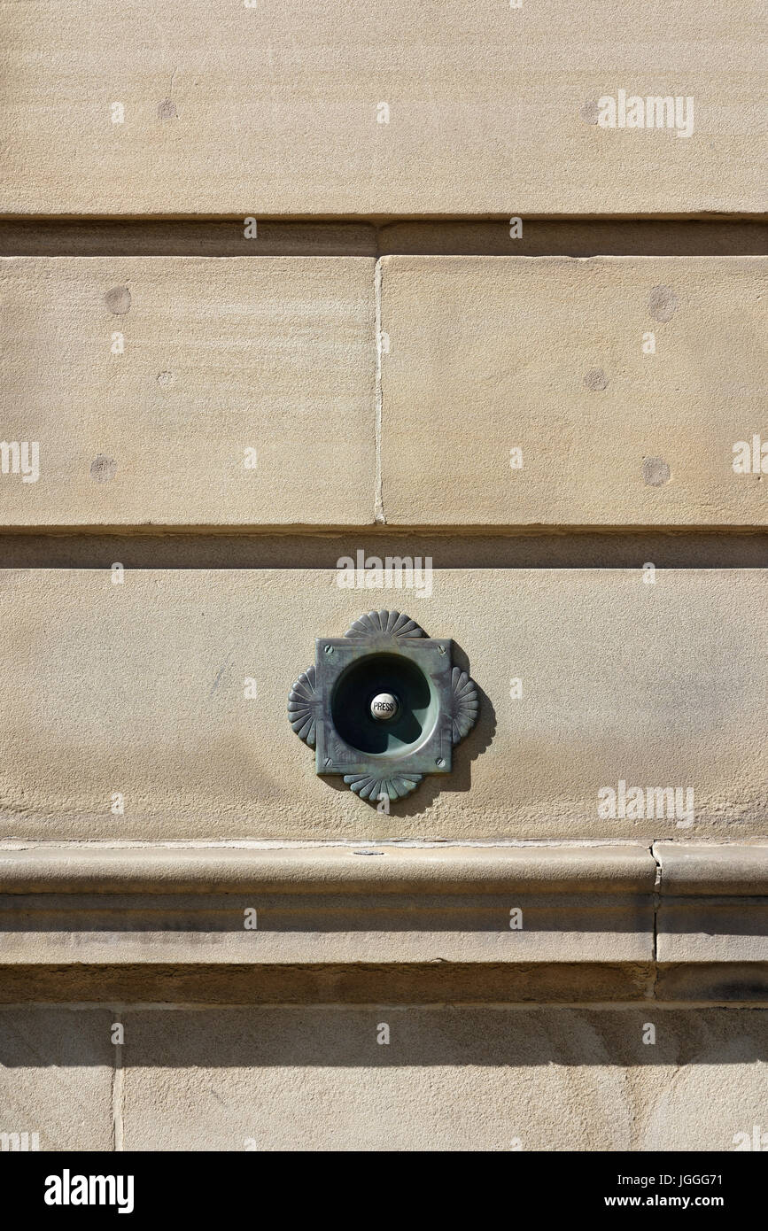 Ornate bell push on rusticated ashlar faced wall in st annes on sea ...