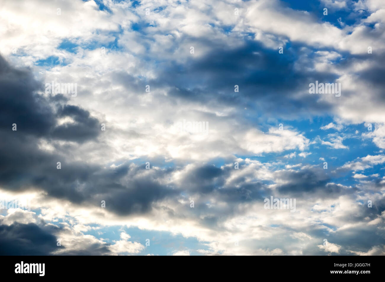 grey clouds and white clouds on bright blue sky. Ominous sky. The soft ...