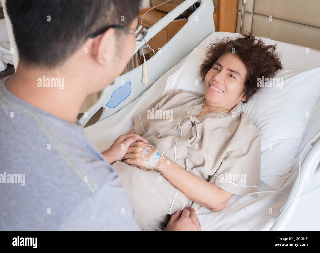 elderly patient get moral support Stock Photo - Alamy