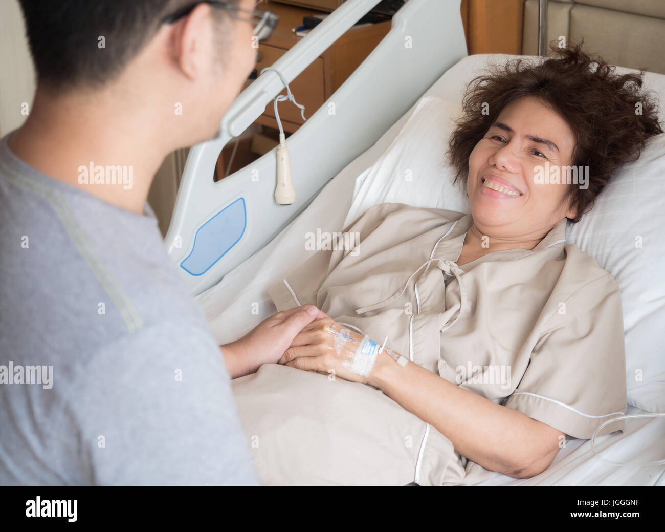 elderly patient get moral support Stock Photo - Alamy
