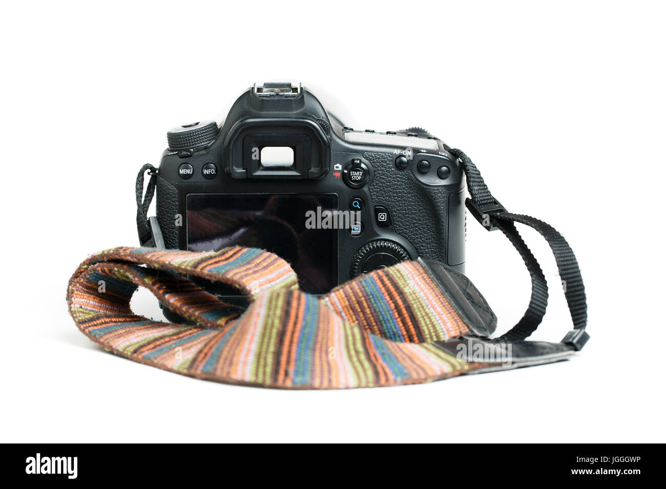 Image of camera and belt on empty white background Stock Photo - Alamy