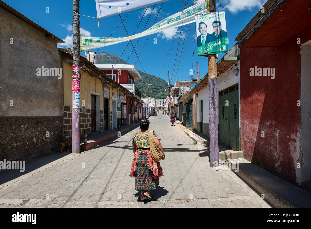 Woman walking on the street in the typical native dress ( Maya ...